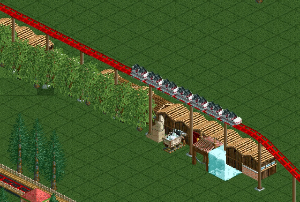 toilets clip through adjacent scenery under passing coaster train ...