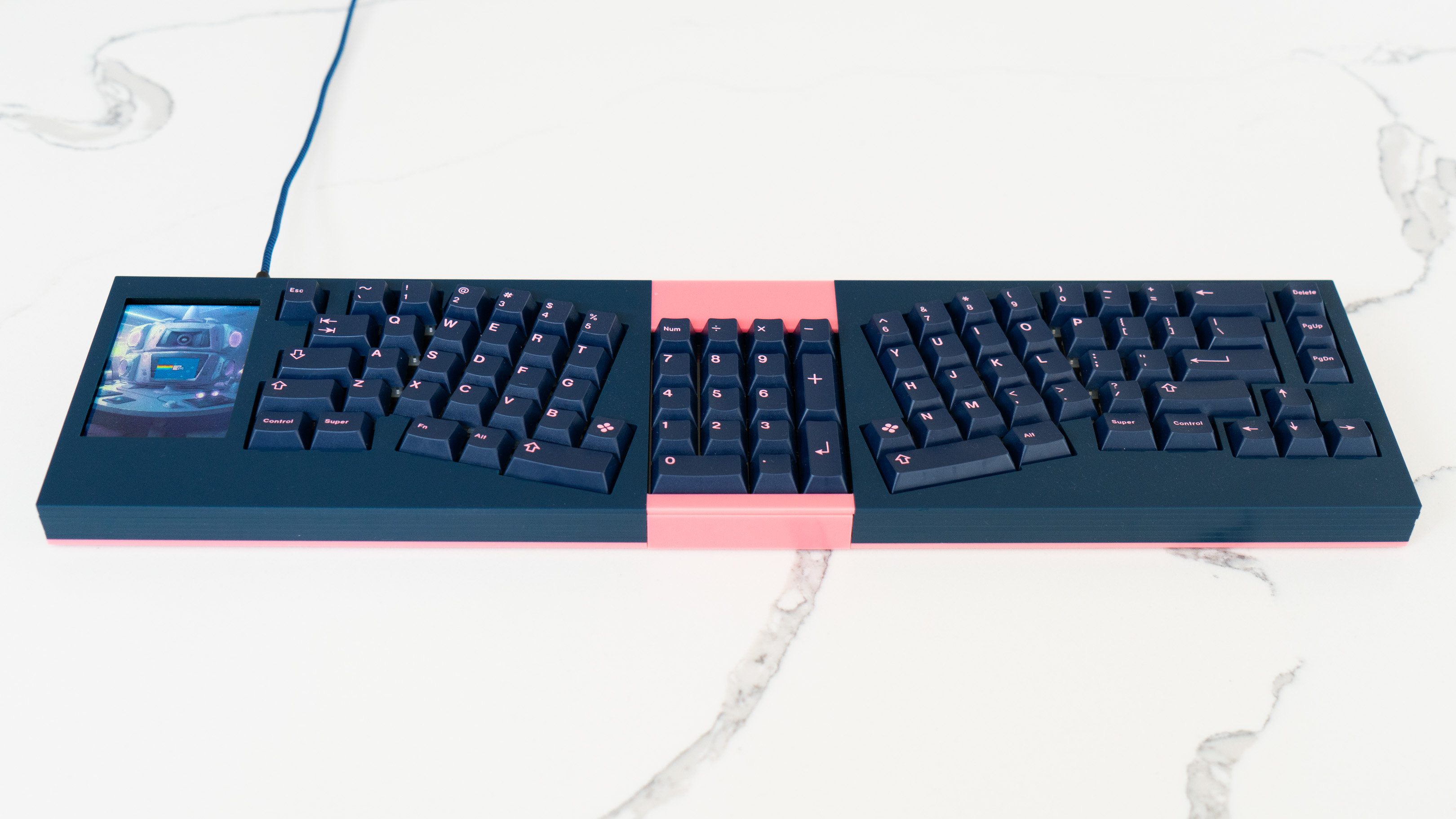 GitHub - dcpedit/midevil: Ergonomic keyboard with number pad in the middle